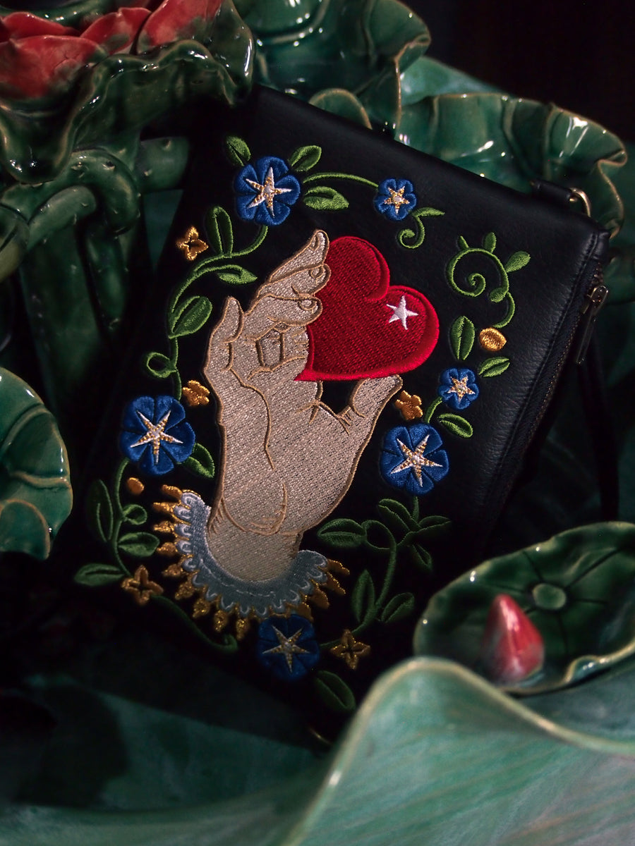 Cupid's Touch Faux Leather Hand Pouch – Shop at Mizuma